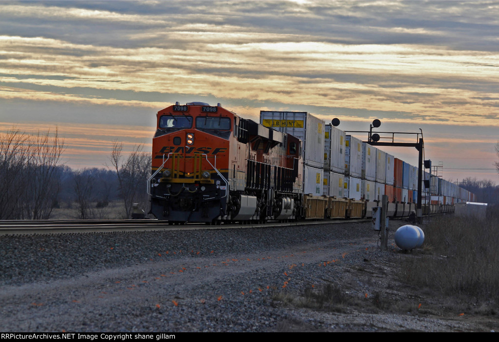 BNSF 7098 a newer c4 heads wb.
